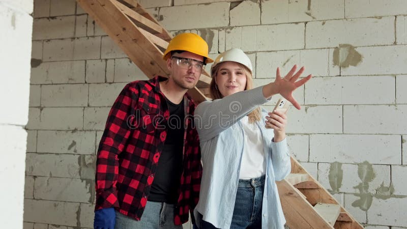 Team of Building Professionals Inspecting Together Dwellings Under Construction Stock Footage ...
