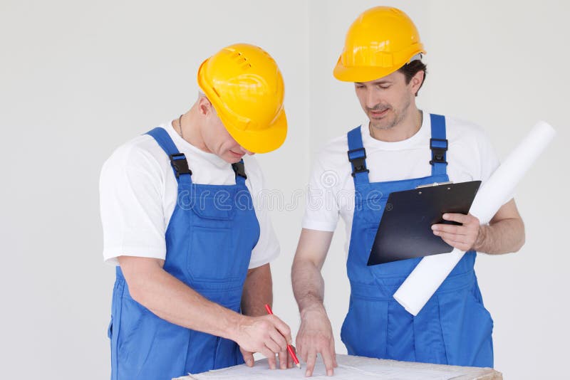 Team of buildres with plan stock image. Image of builder - 80127969