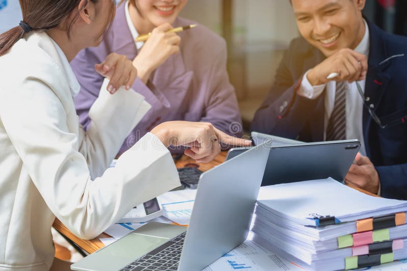 Team Business Three Smiling and Happy Asian Men and Women Team Using ...