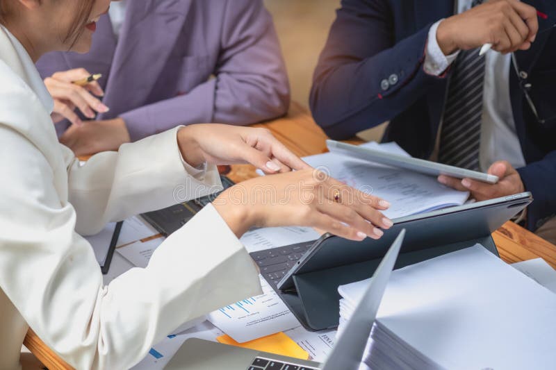 Team Business Three Smiling and Happy Asian Men and Women Team Using ...