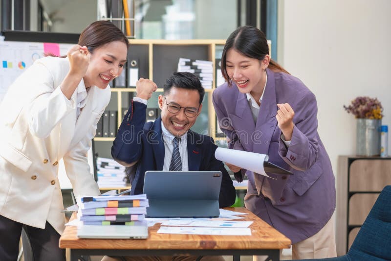 Team Business Three Smiling and Happy Asian Men and Women Team Using ...