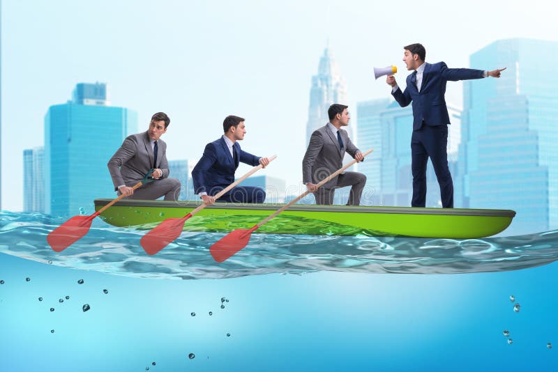 The Team of Businessmen in Teamwork Concept with Boat Stock Photo ...