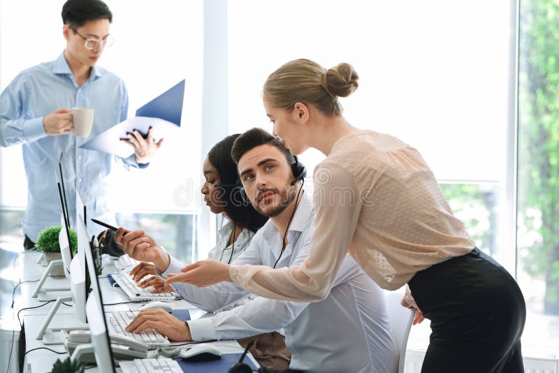 Team of Call Center Operators at Work in Open Space Office Stock Image ...