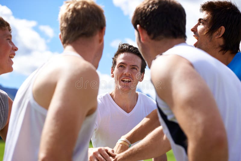 Team Camaraderie. a Group of Young Men Training Outdoors. Stock Image ...
