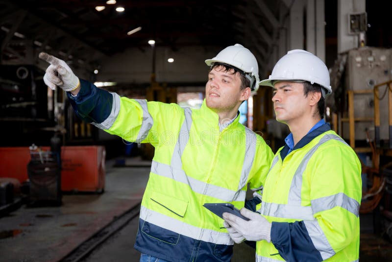 Team Caucasian Engineer Checking Train Looking Tablet in Station, Team ...