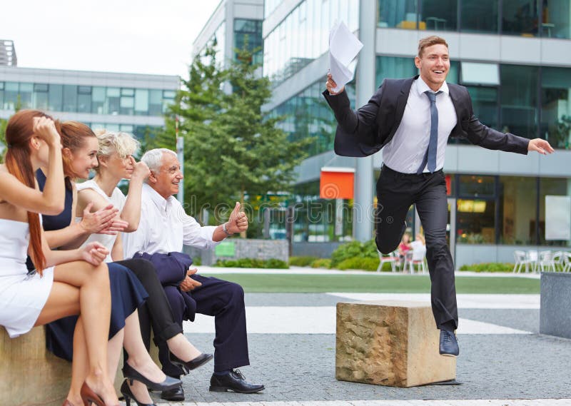 Team Cheering for Business Man for Motivation Stock Photo - Image of ...