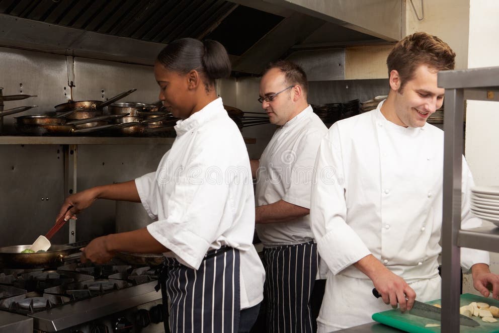 Team of Chefs Preparing Food Stock Image - Image of trainee, whites ...