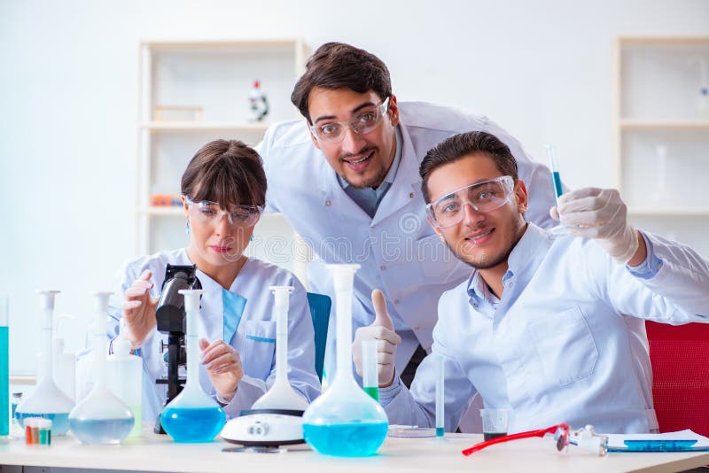 The Team of Chemists Working in the Lab Stock Photo - Image of ...
