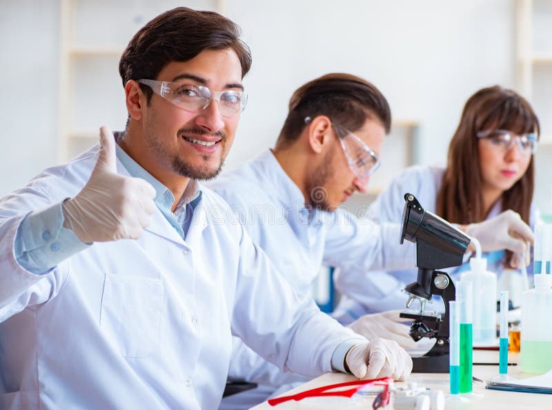 Team of Chemists Working in the Lab Stock Image - Image of chemists ...