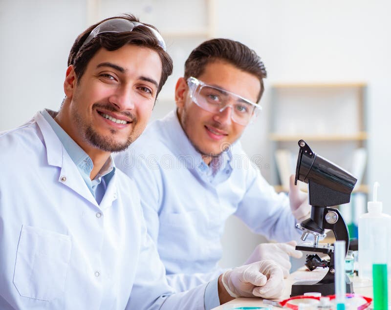 Team of Chemists Working in the Lab Stock Image - Image of sample ...