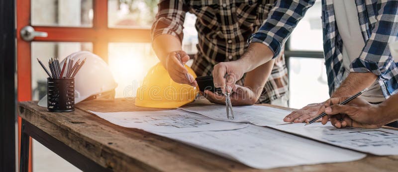Team of Civil Engineers Meeting at Construction Site in Modern City To ...