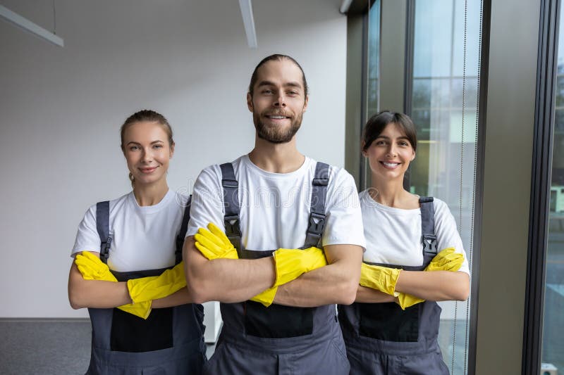 Cleaning Team after Work in the Office Looking Contented and Confident ...