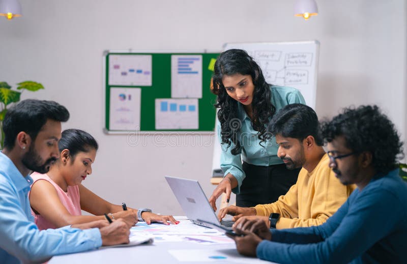 Team of Co-workers Busy Working at Office during Discussion or Business ...