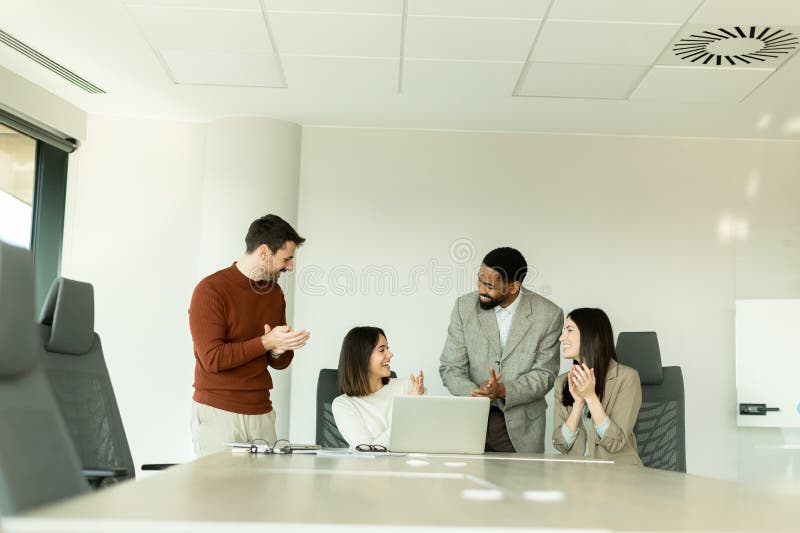 Team Collaboration in a Modern Office Setting Creates Innovative ...