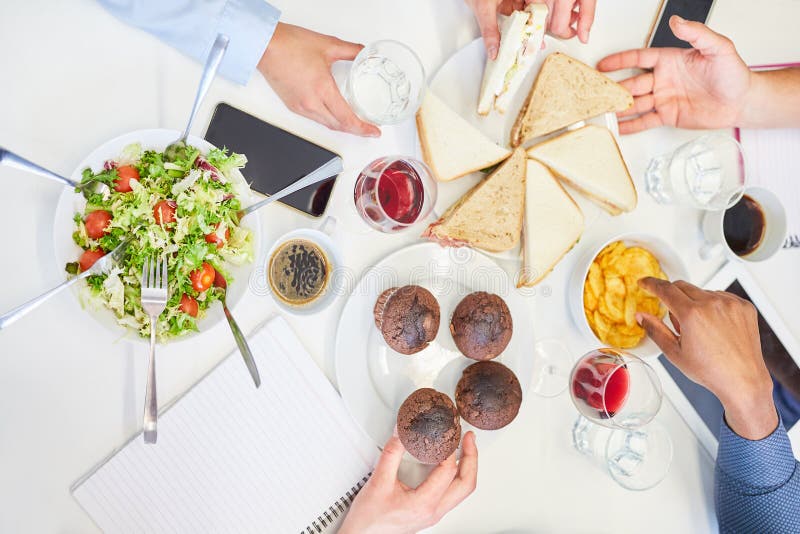 Team Colleagues Share Different Snacks Stock Image - Image of meal ...