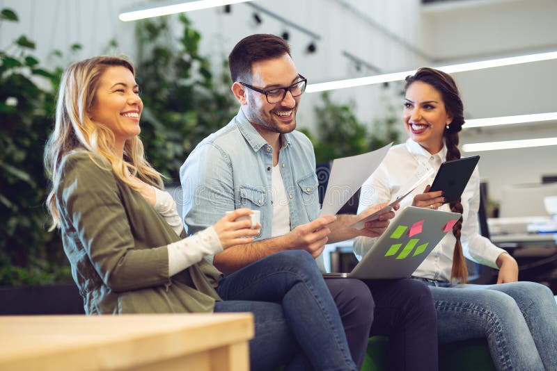 Team of Colleagues Working Together on a Project Stock Photo - Image of ...