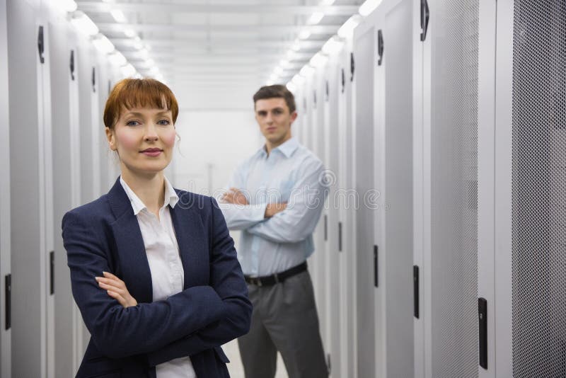 Team of Computer Technicians Looking at Camera Stock Image - Image of ...
