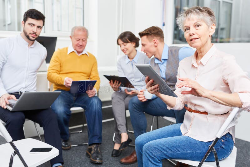 Team in computer workshop stock image. Image of cooperation - 134832089