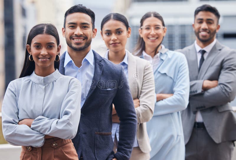 This Team Conquers All. a Diverse Group of Businesspeople Standing in a ...