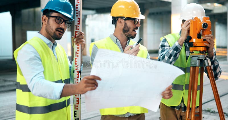 Team of Construction Engineers Working on Building Site Stock Image ...