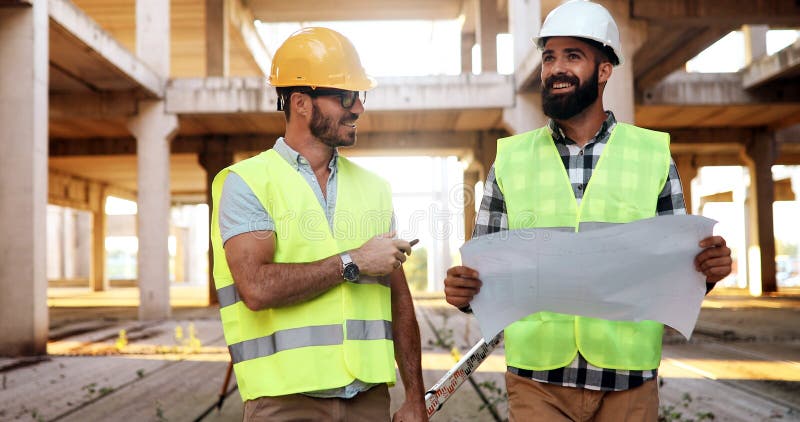 Team of Construction Engineers Working on Building Site Stock Photo ... Team of Construction Engineers Working on Building Site Stock Photo ...