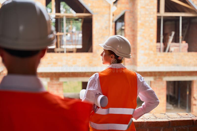 Team of Construction Professionals Conducting Development Site ...