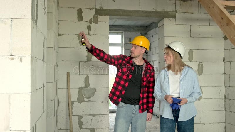 Team of Construction Professionals Performing Inspection of Building ...