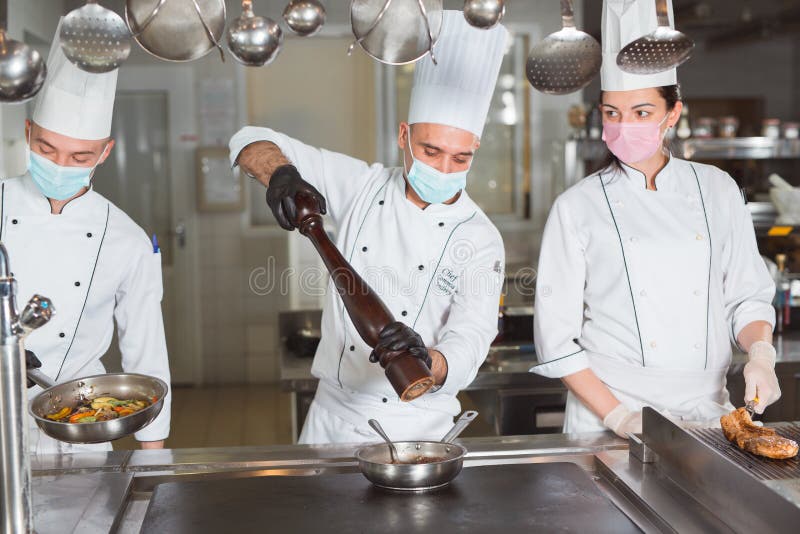 Team of Cooks Cooks in a Restaurant Stock Image - Image of chef ...