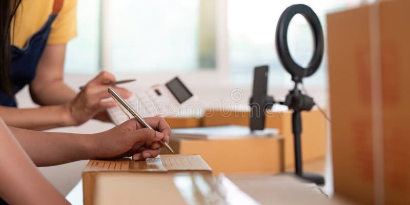 Ecommerce Operations. Team Coordinating Package Logistics with Digital Tools and Collaboration ...