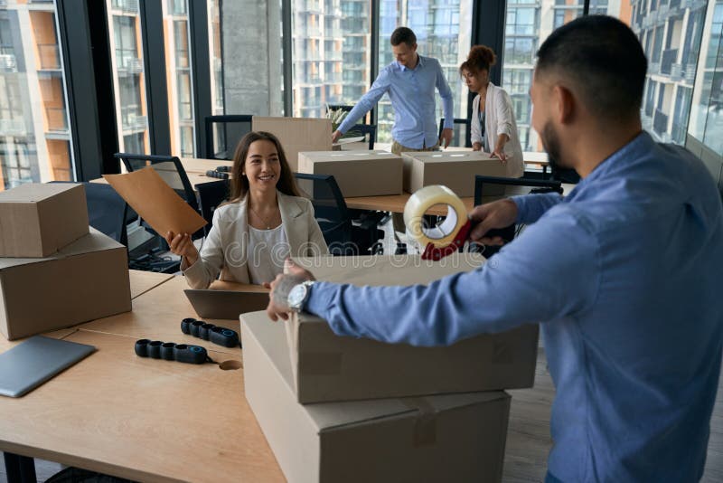 Team of Coworkers Preparing for Office Move Stock Image - Image of ...