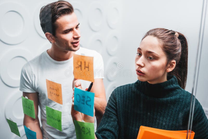 Two Project Managers Having Meeting Stock Photo - Image of discussing ...
