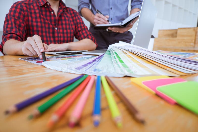 Team of Creative Graphic Designer Meeting Working on New Project ...