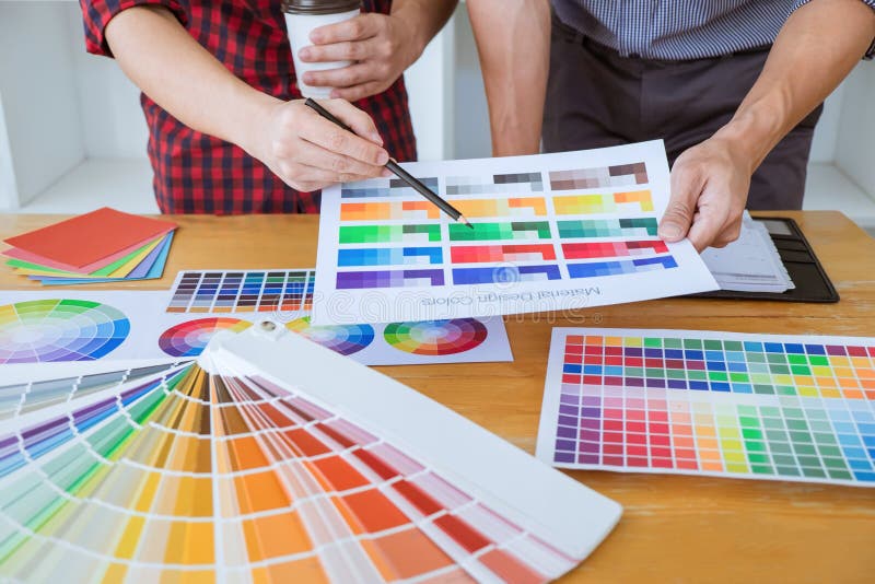 Team of Creative Graphic Designer Meeting Working on New Project ...