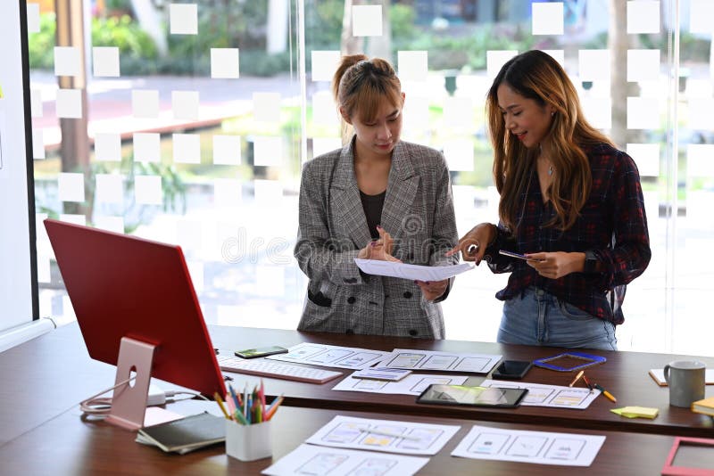 Team of Creative Web Designers Discussing and Developing Template ...