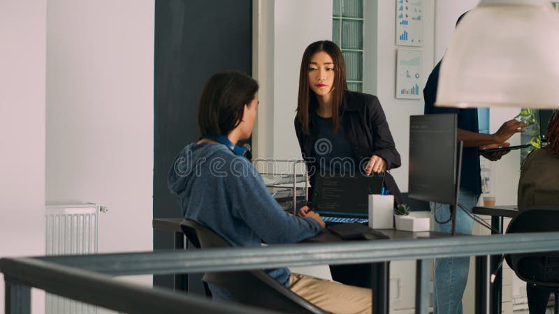 Team of Database Admins Analyzing Source Code on Computer Monitor Stock Photo - Image of network ...