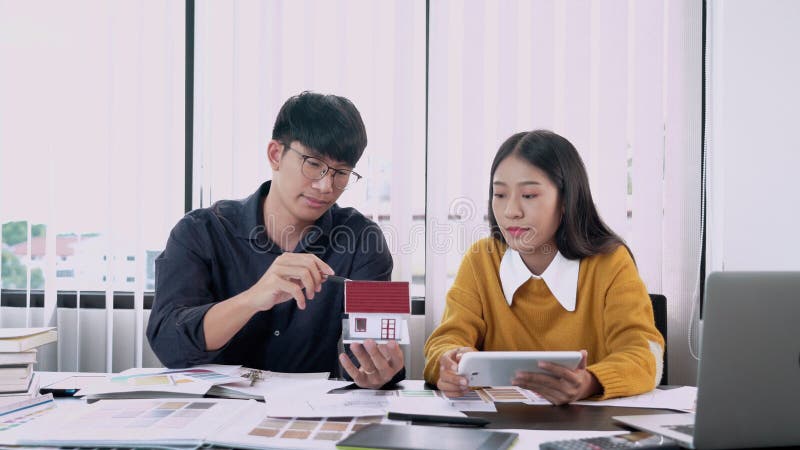 Team Designer Working Graphic with Color Chart on New Project with Work ...