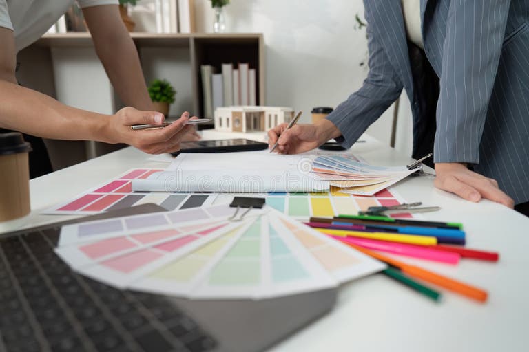 Creative Team Discussing Color Options for Design Project Stock Photo ...