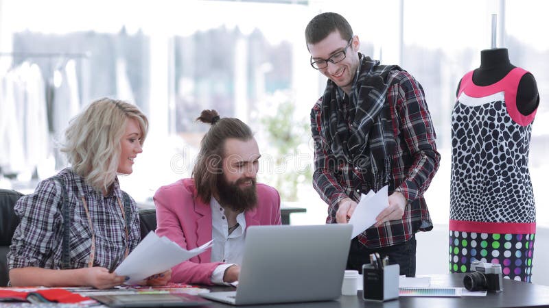 Team of Designers Discussing New Ideas in the Studio Stock Image ...