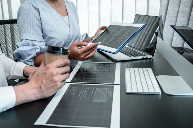 Team Of Developer Programmer Working On Coding Program Software Computer In Office Writing