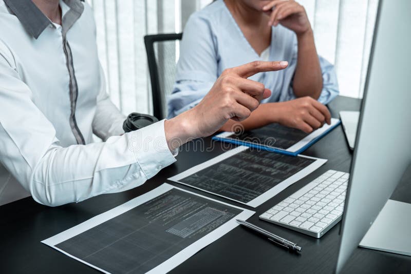 Team Of Developer Programmer Working On Coding Program Software Computer In Office Writing