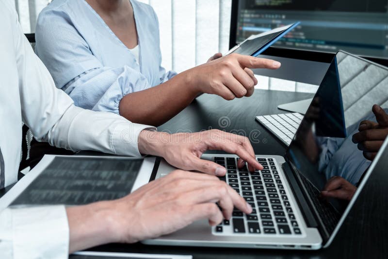 Team Of Developer Programmer Working On Coding Program Software Computer In Office Writing