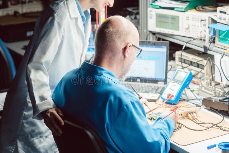 Team of Development Engineers Designing New Product in the Lab Stock ...