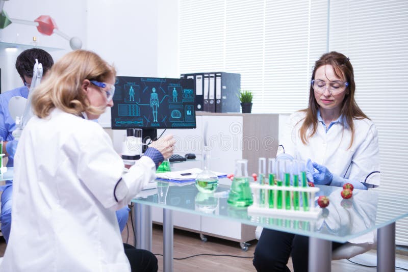 Team of Different Ages of Scientist Team in a Research Lab Stock Photo ...