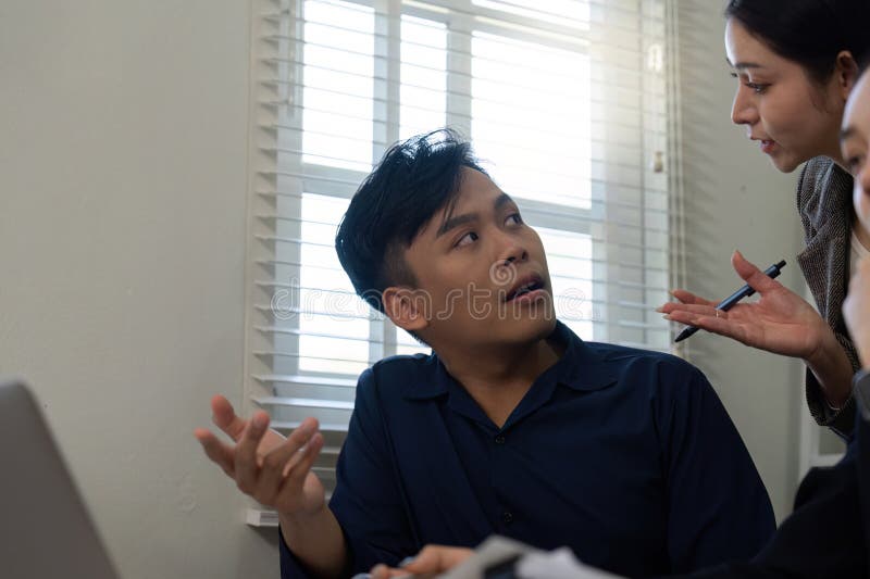 Team Discussing Project Issues with Visible Frustration in a Modern ...