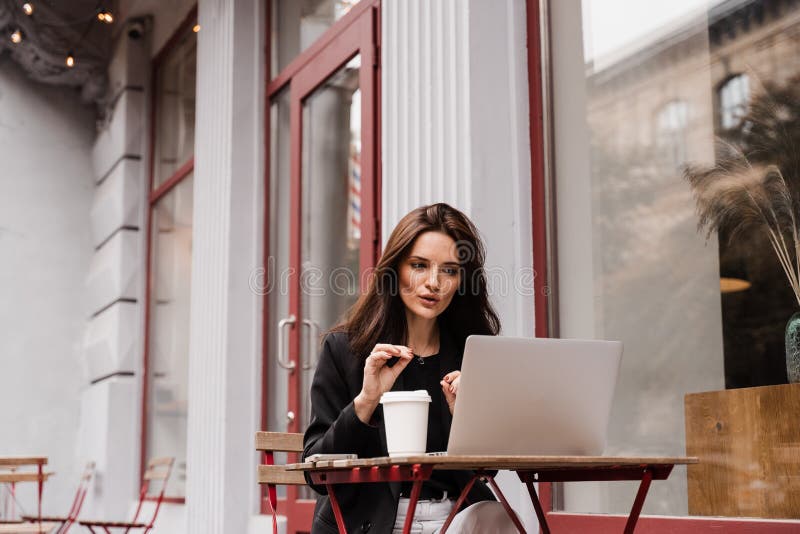 Team Discussion and Problem Solving Remotely. Girl Manager with Laptop ...