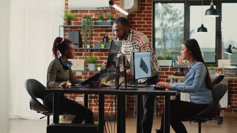 Team of Diverse Colleagues Developing Digital Software in Production ...