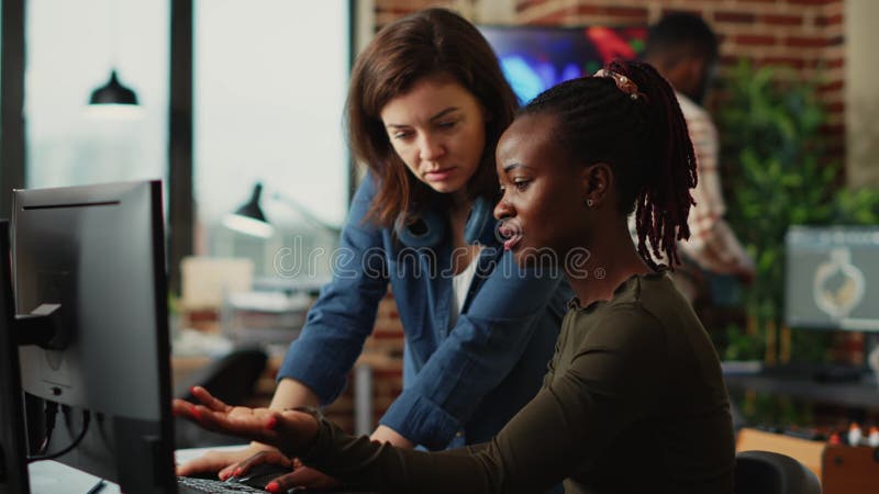 Team of Diverse Office Employees Working on Multi Monitors Stock Video ...