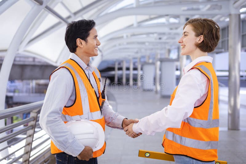 Team of Architecture and Engineer Having Handshake and Agreement on ...