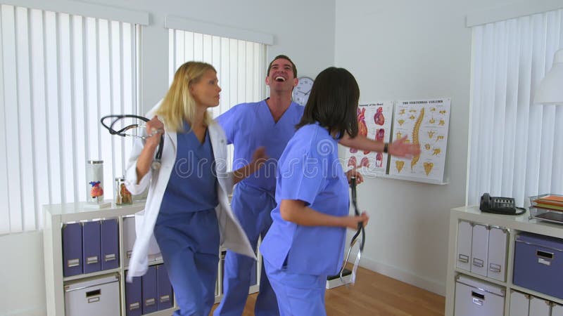 Team of Doctors Dancing in the Office Stock Footage - Video of silly ...