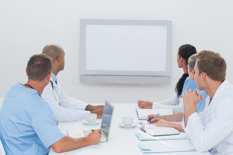 Team of Doctors Having a Meeting Stock Image - Image of doctor, laptop ...